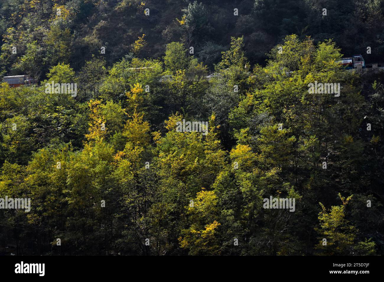 Vehicles move along the Srinagar- Jammu national highway during an ...