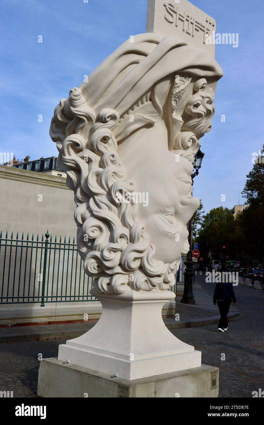 Upside-down sculpture (Shift) in front of the Madeleine church on Place ...