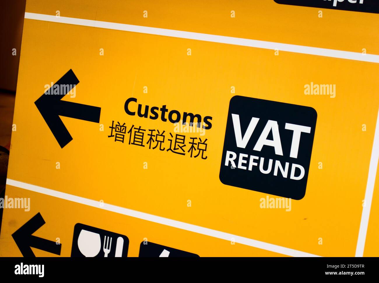Customs office sign at the airport, in english and chinese. Tax refund ...
