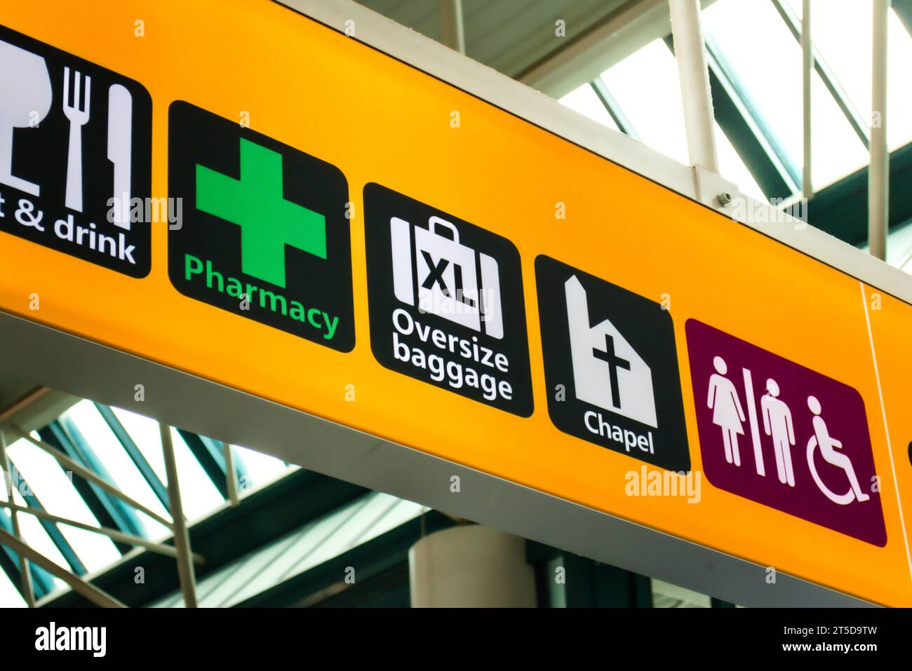 Information symbols and icons in a signboard at the airport Stock Photo ...
