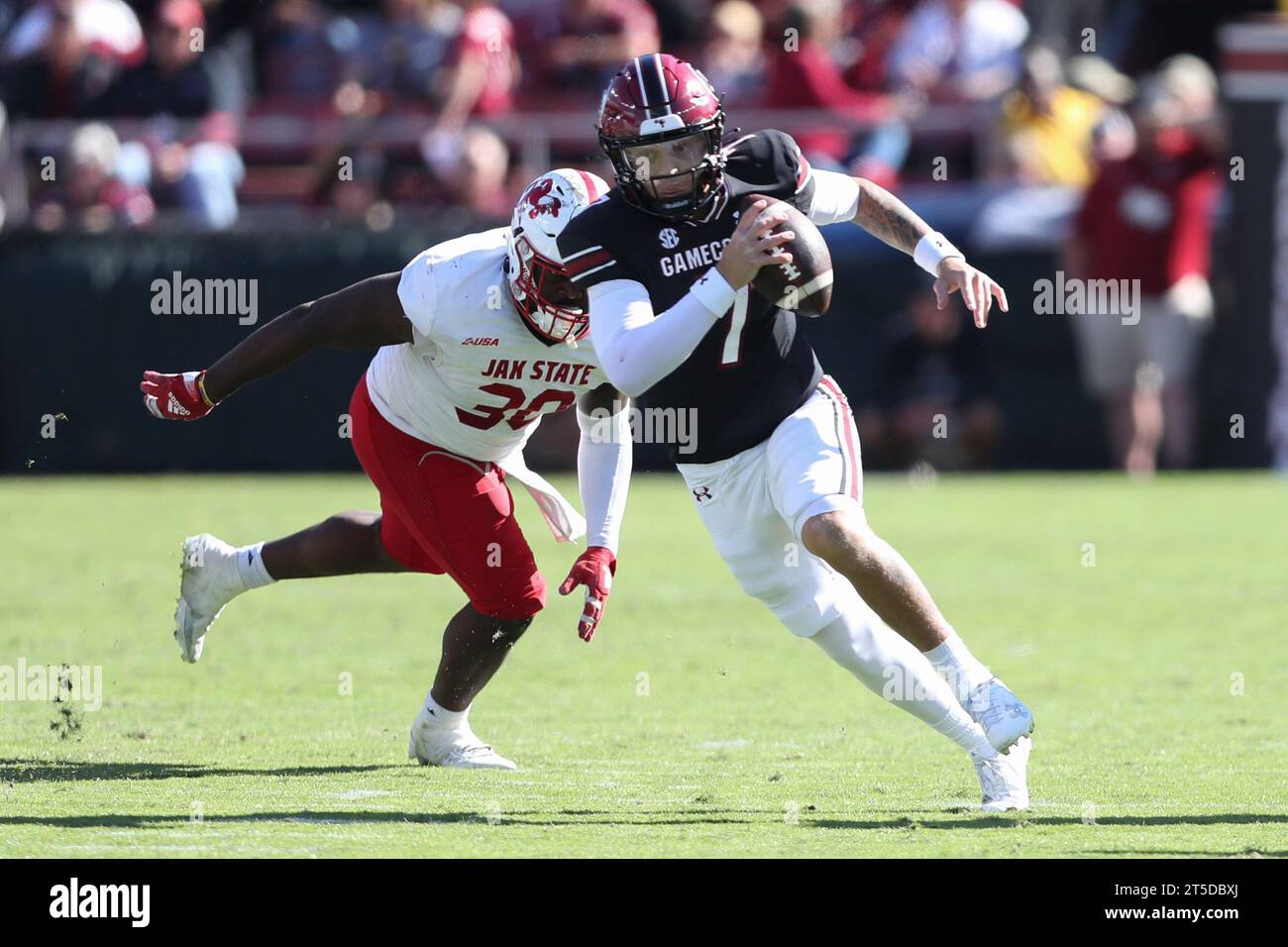South Carolina quarterback Spencer Rattler (7) runs past Jacksonville ...