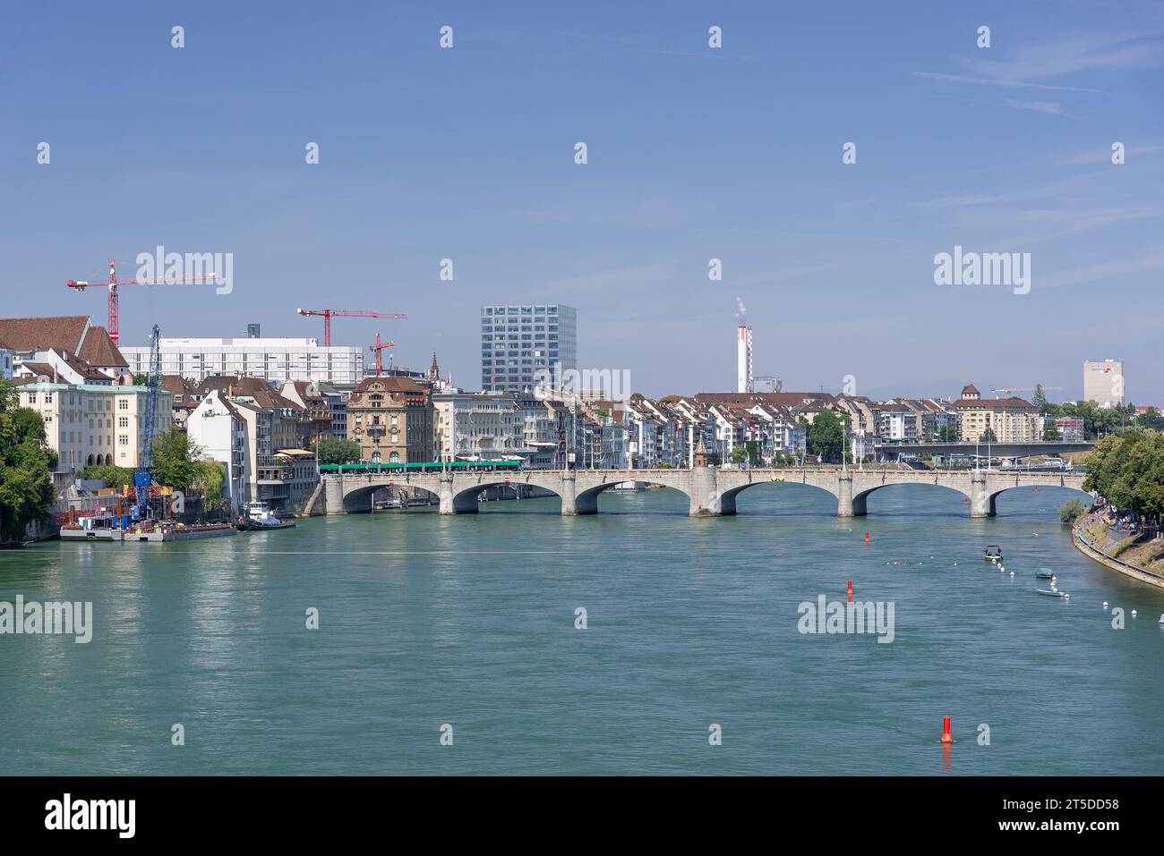 Basel, Switzerland - The Rhine with the town of Basel to the left with ...