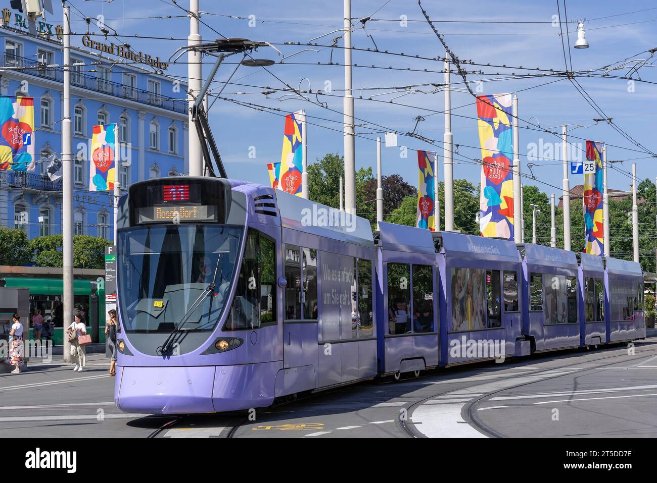 Basel, Switzerland - Purple tram Stadler Tango in a street Stock Photo ...
