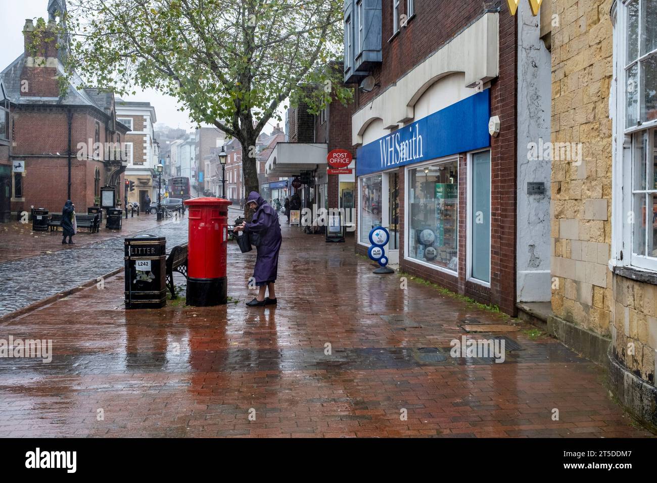 Woman posting letter in post hi-res stock photography and images - Alamy