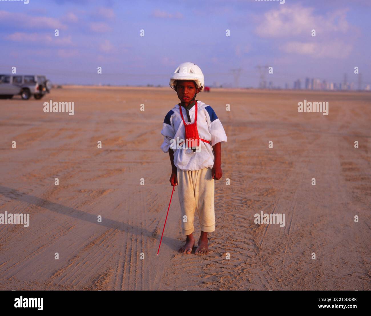A Portrait of A Child Camel Jockey Moments After Finishing A Race ...