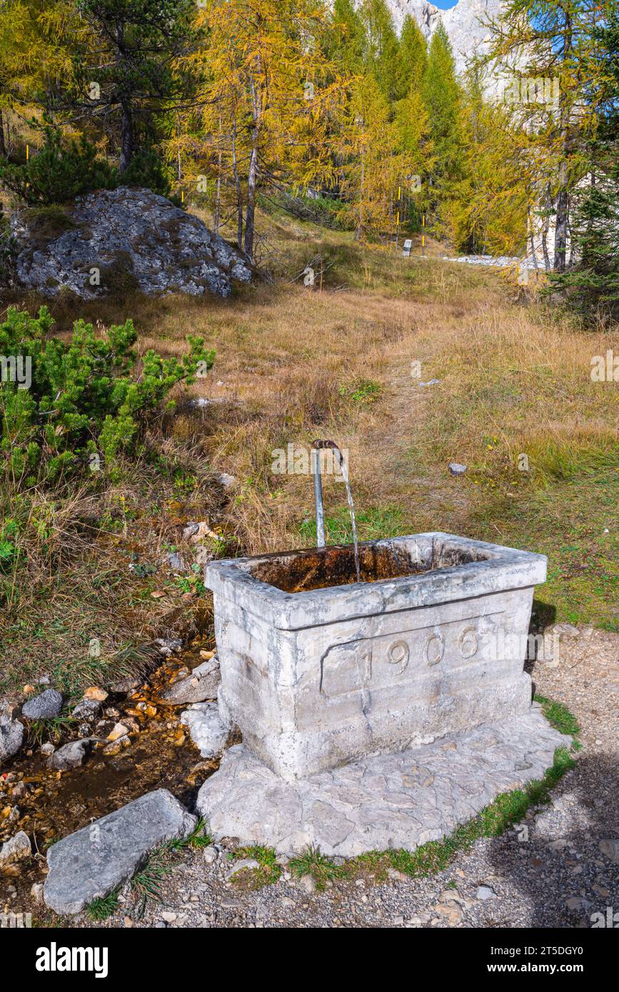 Old stone vessel with mountain water Stock Photo - Alamy