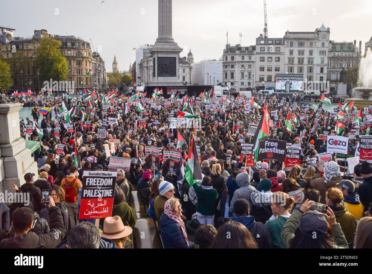 London, UK. 04th Nov, 2023. Protesters hold pro-Palestine placards and ...