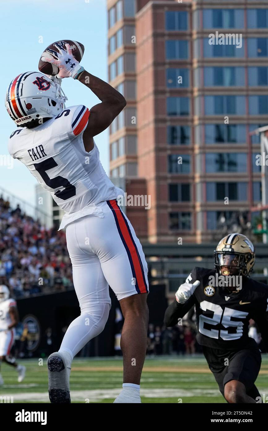 Auburn wide receiver Jay Fair (5) makes a catch over Vanderbilt cornerback Martel Hight (25) in ...