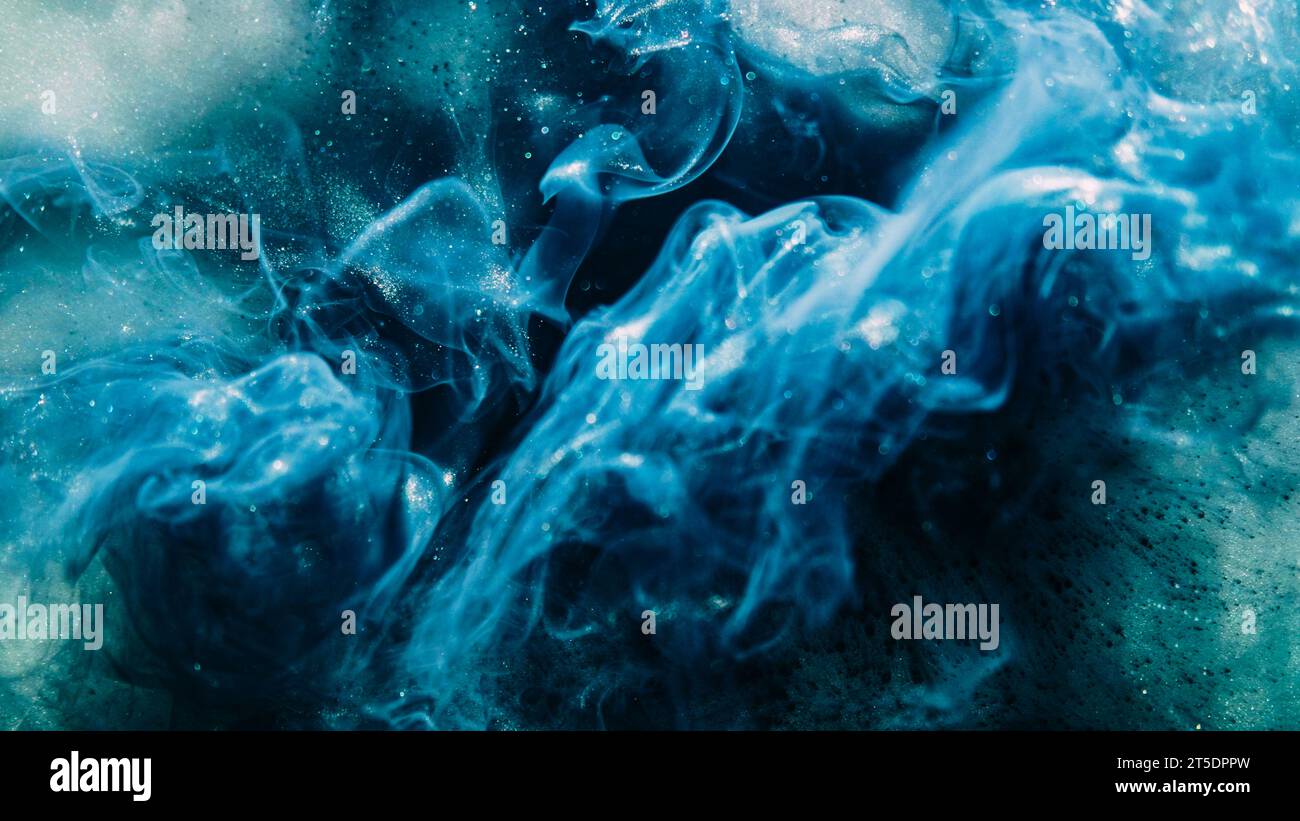 Color smoke background blue glitter paint water Stock Photo - Alamy