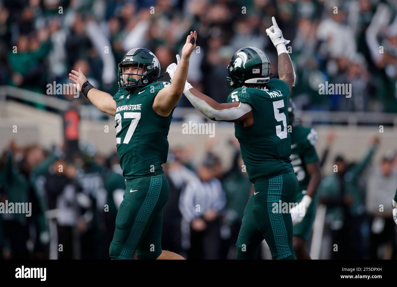 Michigan State linebackers Cal Haladay, left, and Jordan Hall (5 ...