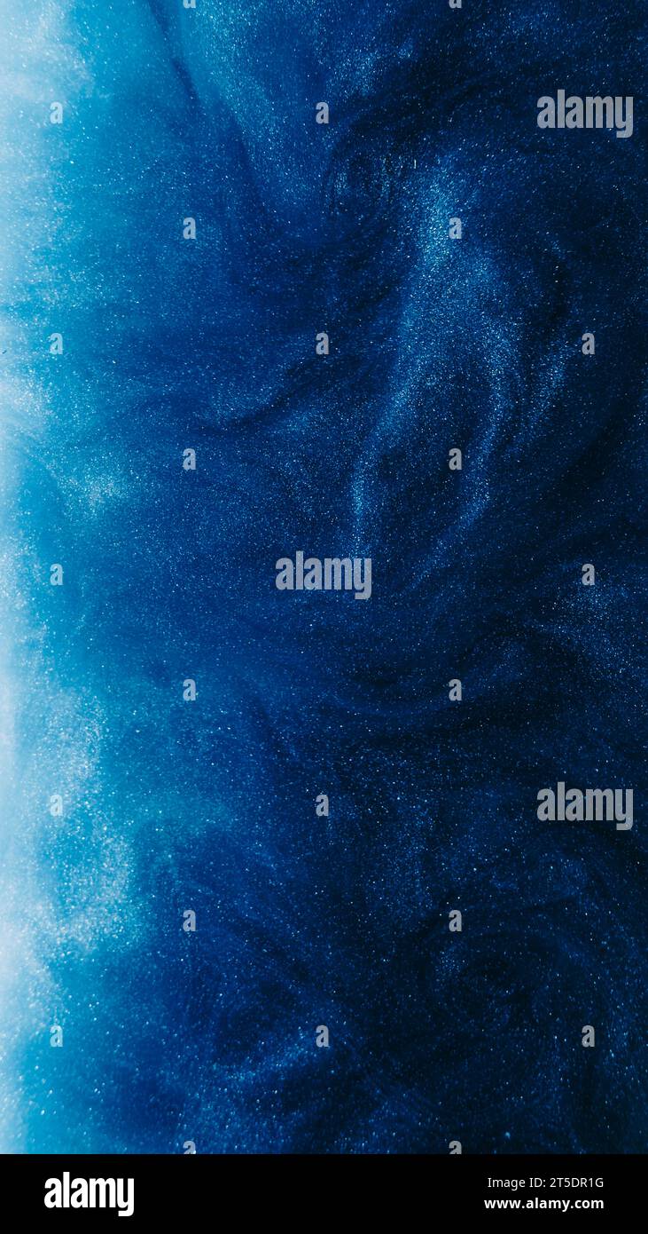 Glitter abstract background blue shimmering fluid Stock Photo - Alamy