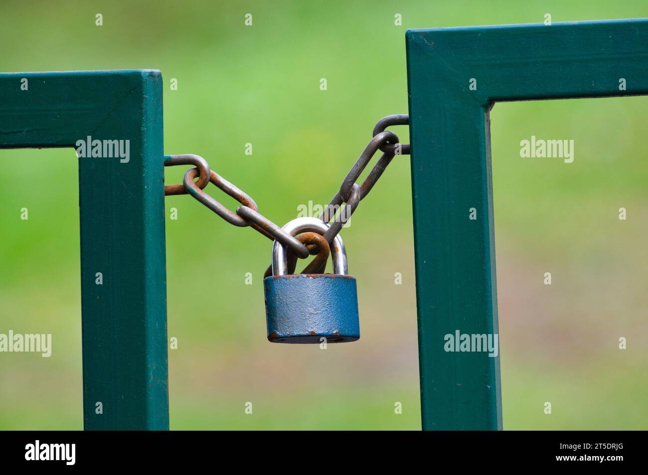Locked security padlock. No entry or no trespassing on private property ...