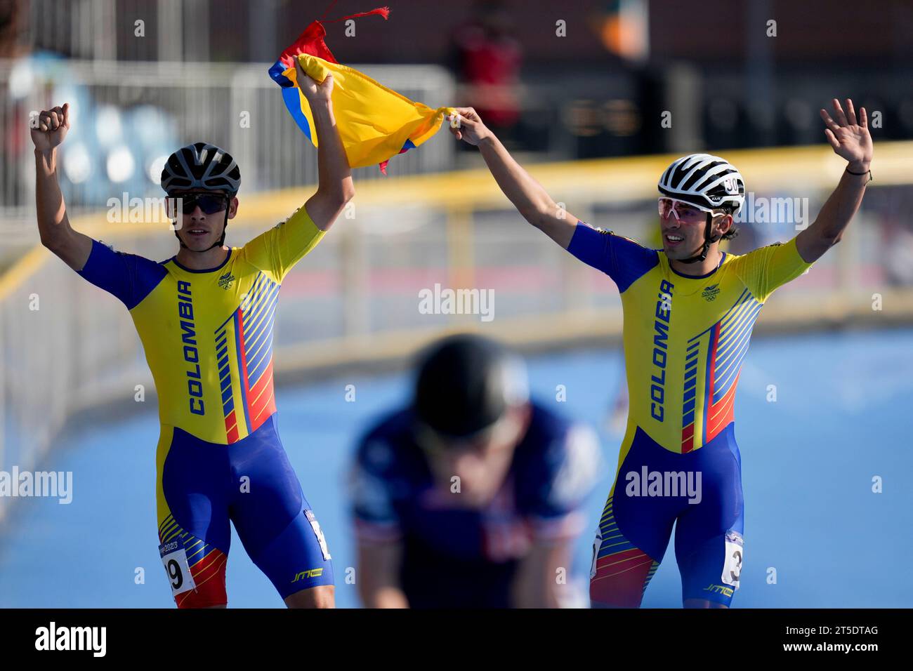 Colombia's Juan Mantilla, right, celebrates winning a gold medal as ...