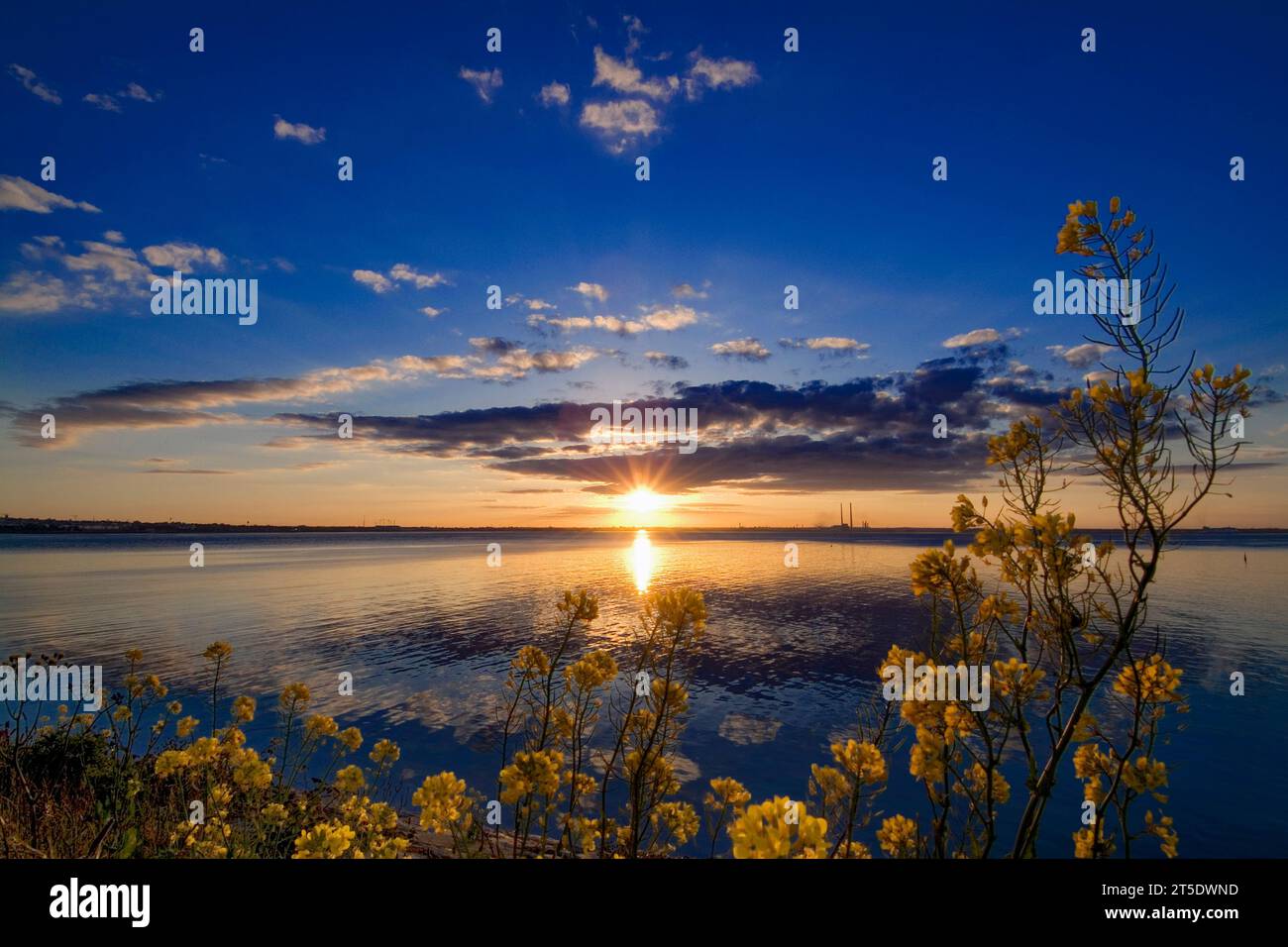 The sun sets over Dublin viewed from Dun Laoghaire, County Dublin ...