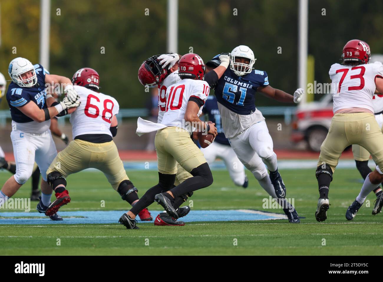 Harvard Crimson quarterback Jaden Craig #10 goes back to avoid pressure ...