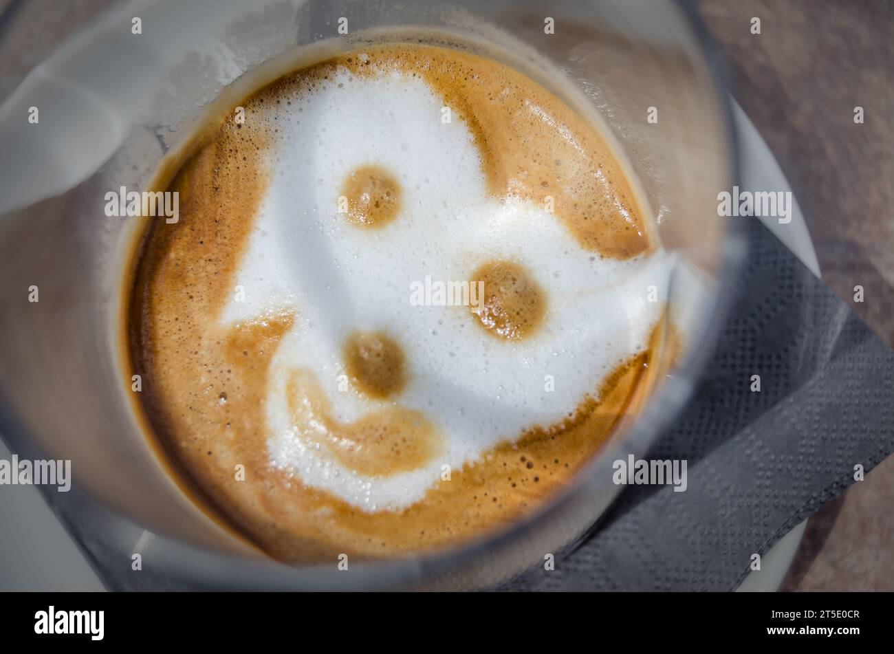 Coffee decorated with a smiley face figure made of milk foam Stock ...