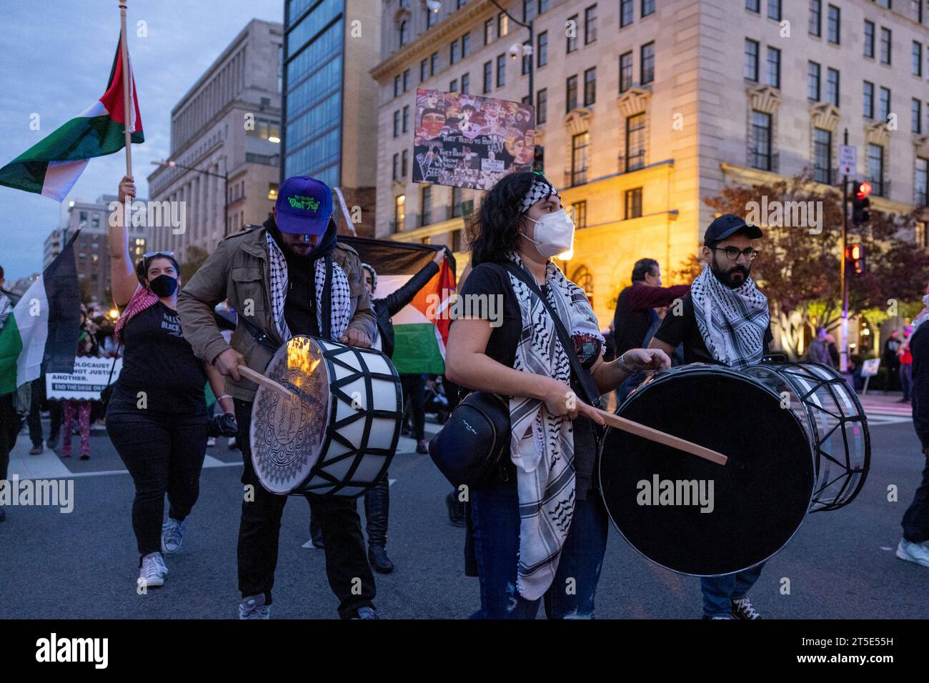 People drum as they march during a pro-Palestinian demonstration near ...