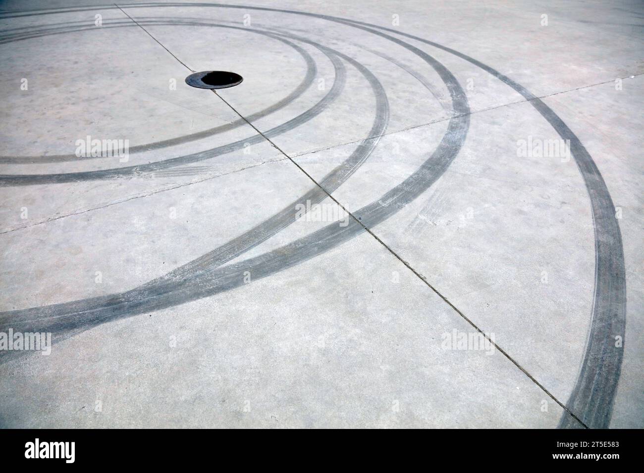 wheel track is on the cement ground Stock Photo - Alamy