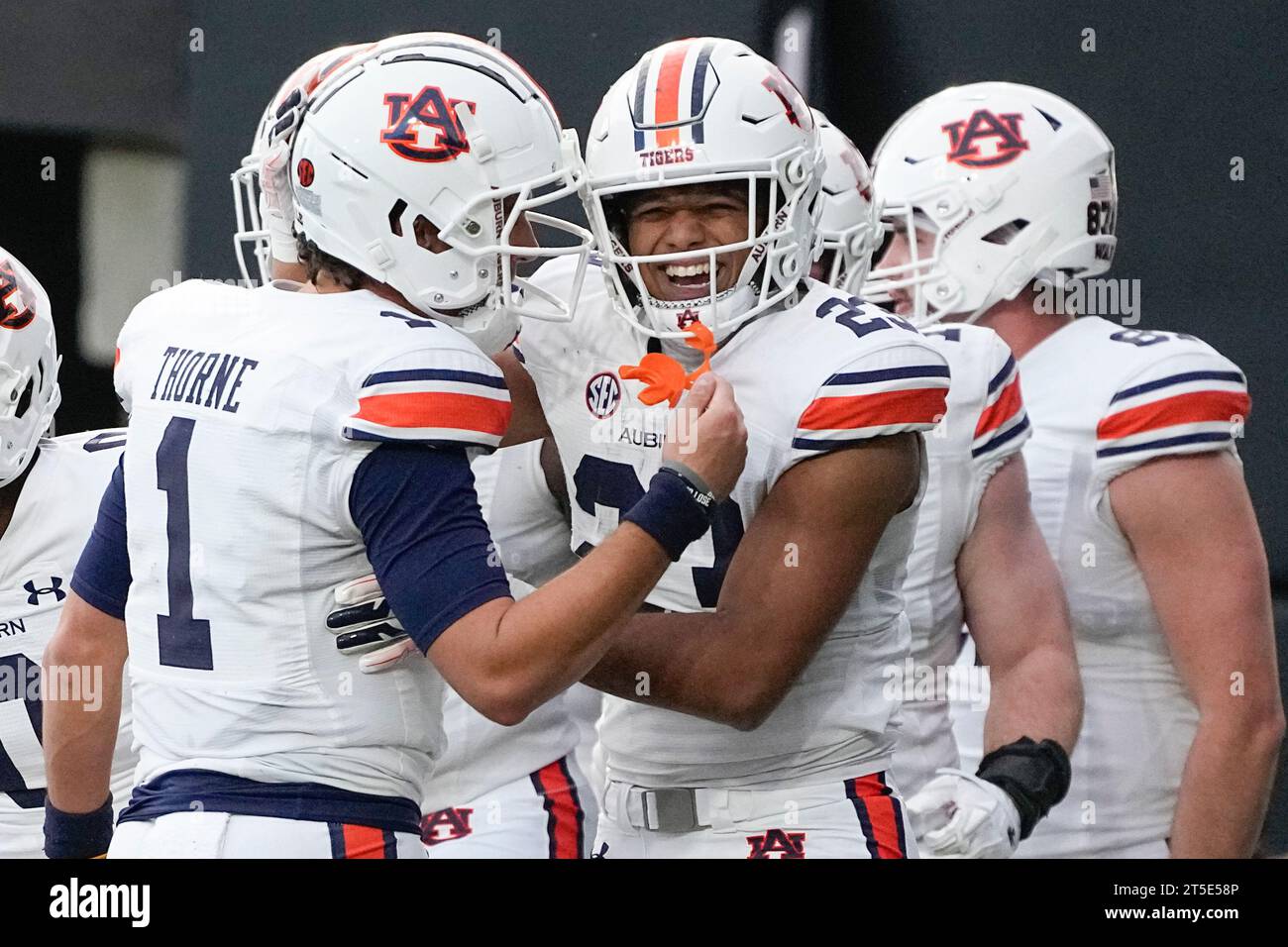 Auburn running back Jeremiah Cobb, right, celebrates a touchdown with ...