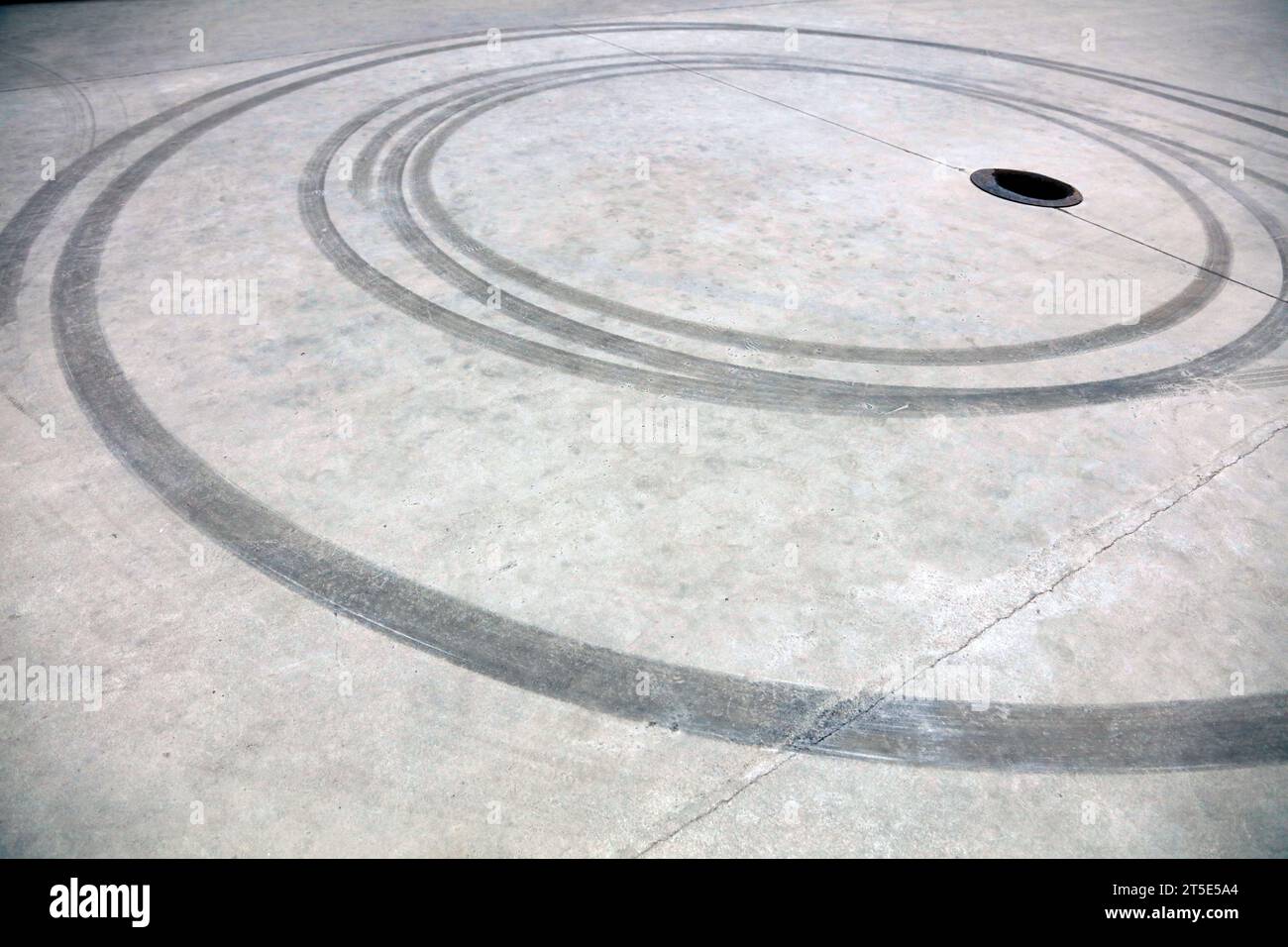 wheel track is on the cement ground Stock Photo - Alamy
