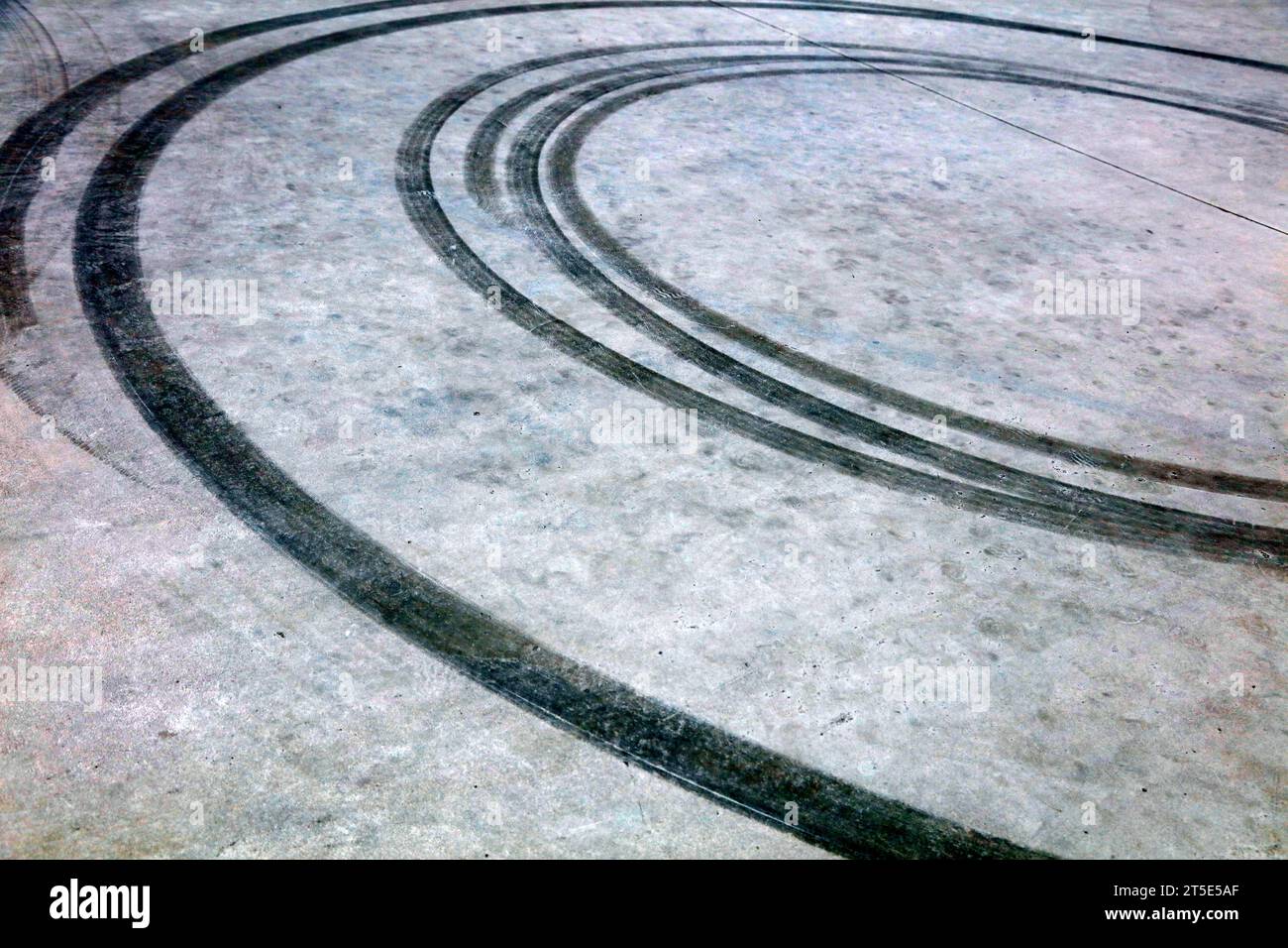 wheel track is on the cement ground Stock Photo - Alamy