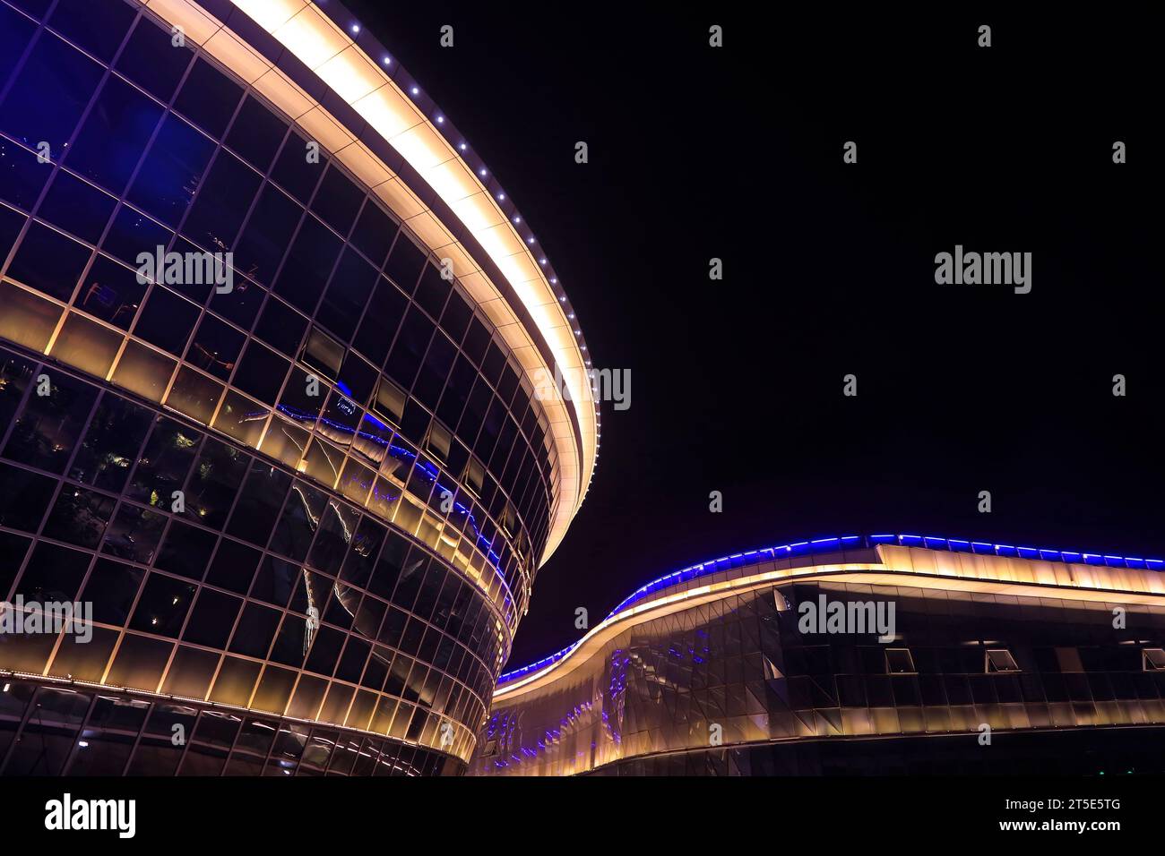 Glass curtain wall lighting landscape Stock Photo - Alamy