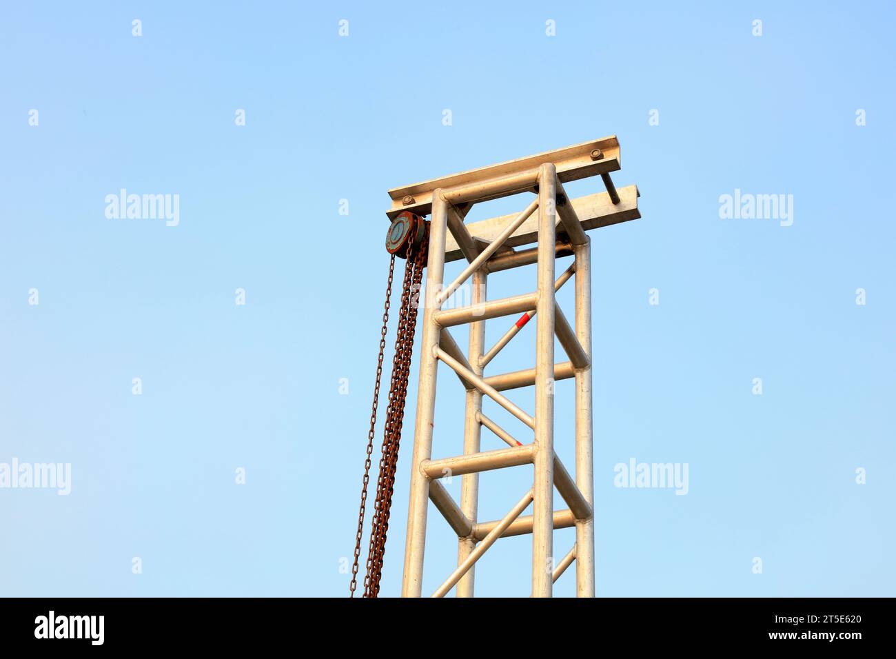 Steel brackets and chains Stock Photo - Alamy
