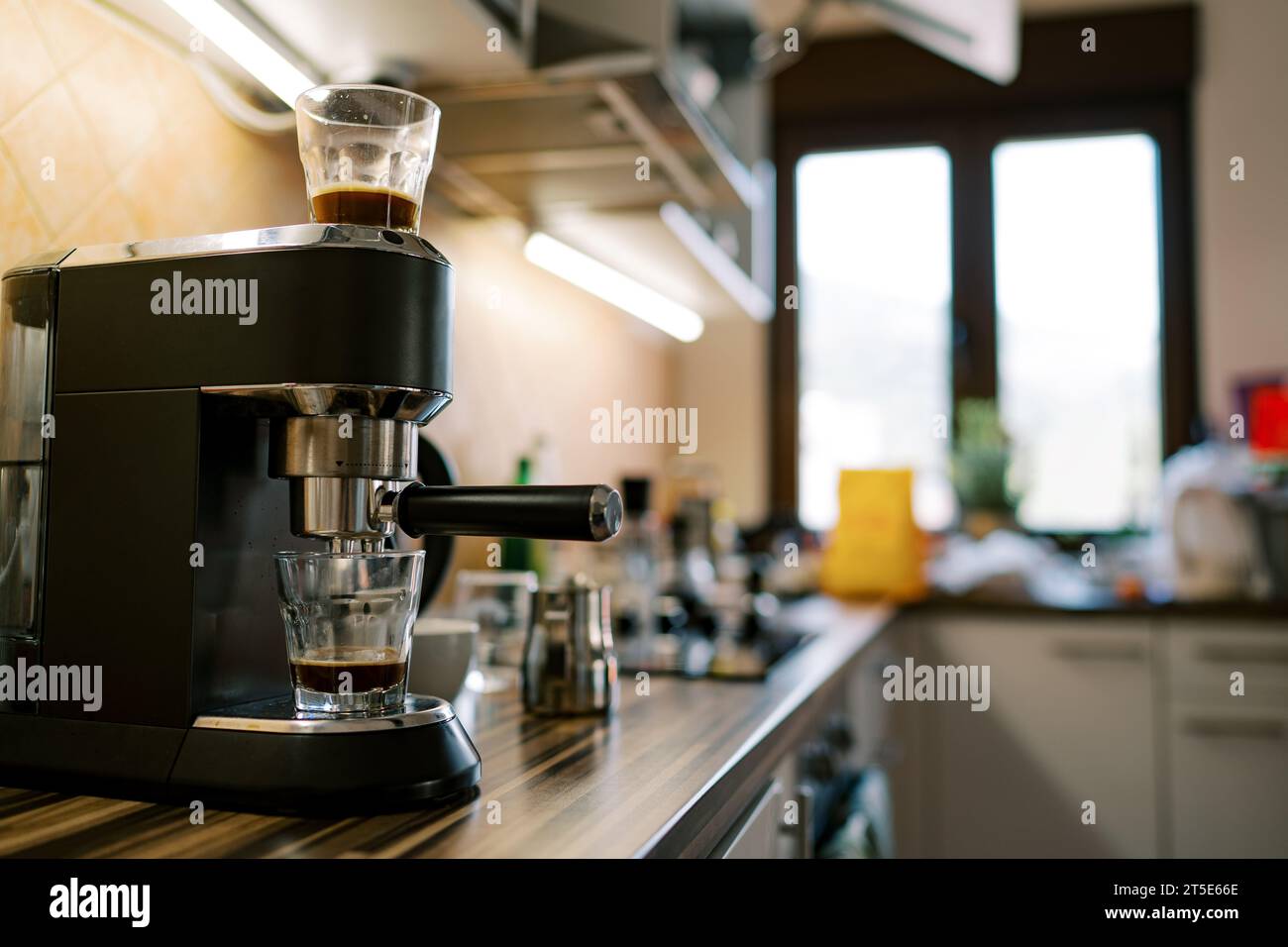 Black coffee dripping from maker hi-res stock photography and images ...