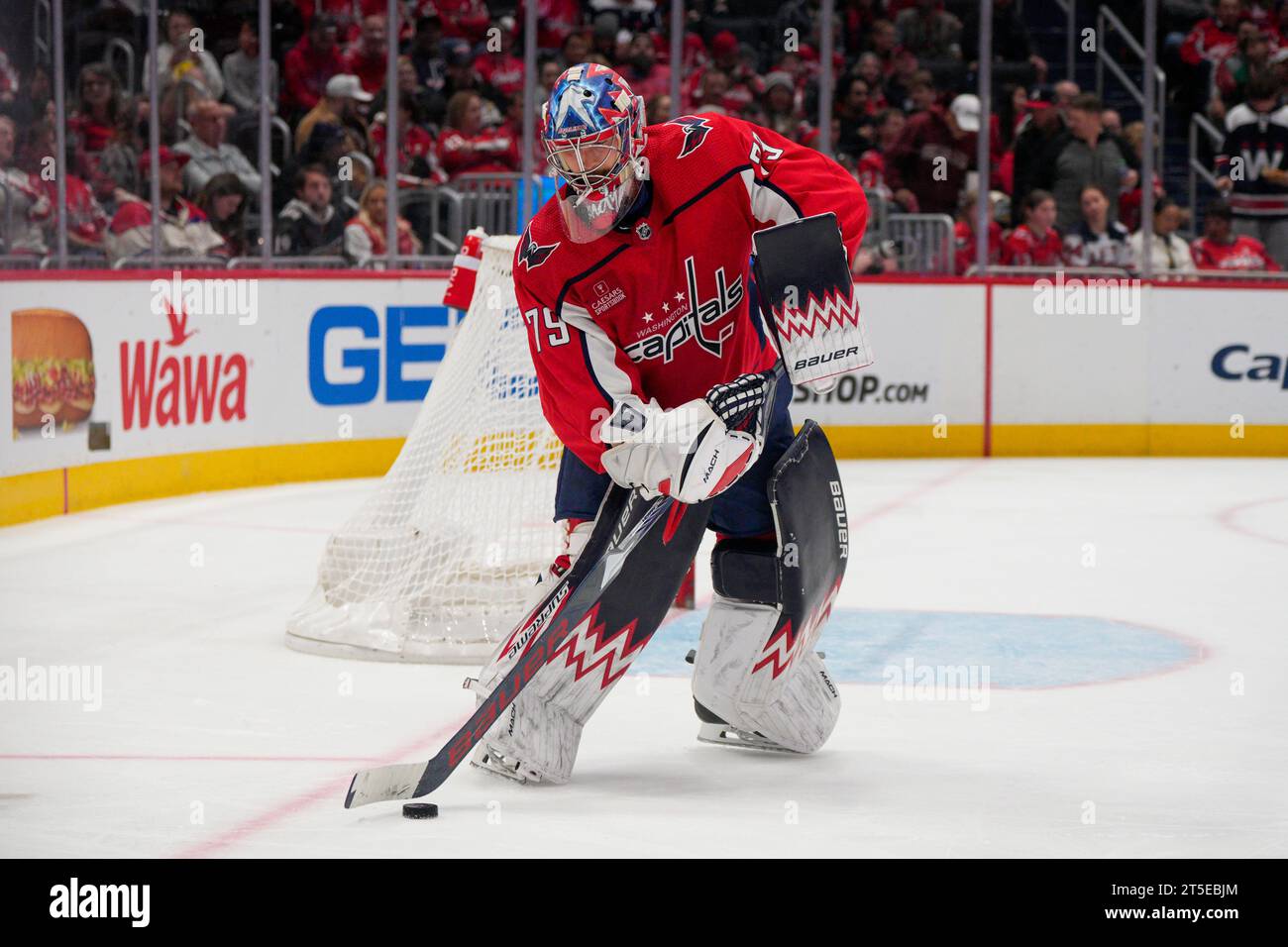 Washington Capitals goaltender Charlie Lindgren controls the puck ...