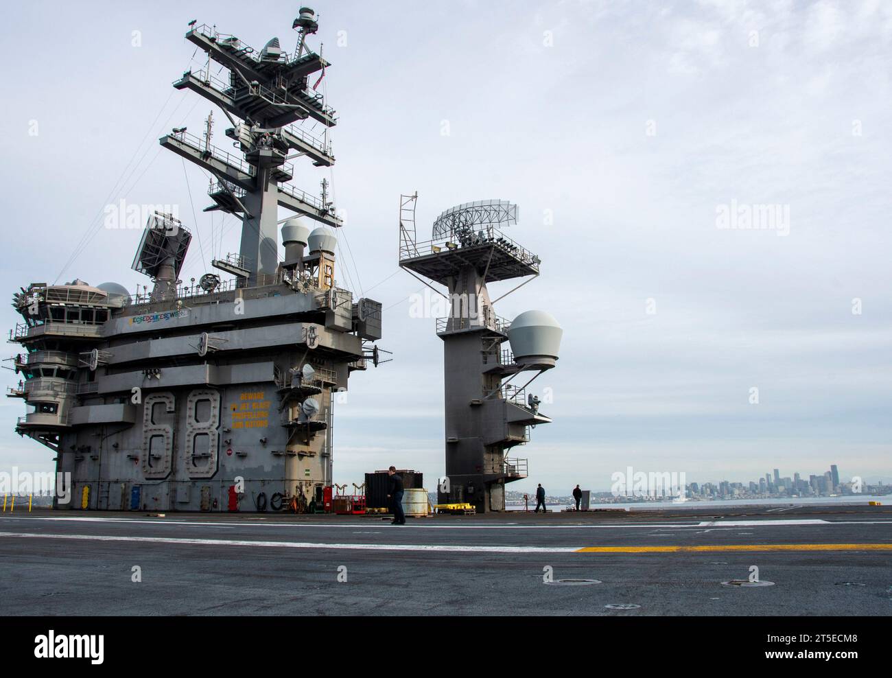 231103-N-KV075-1205 The aircraft carrier USS Nimitz (CVN 68) transits ...