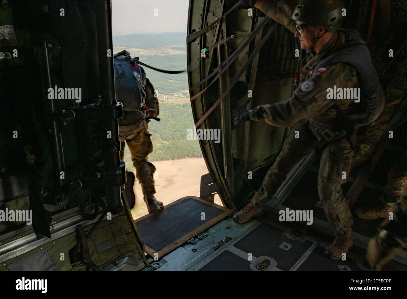 Polish air force members with the 6th Airborne Brigade, 33rd Air Base ...