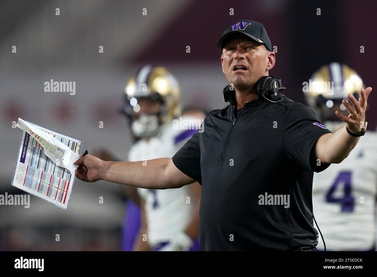 Washington head coach Kalen DeBoer reacts during the first half of the ...
