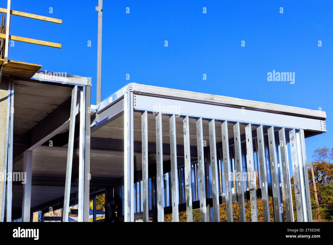 Construction of an industrial commercial building is framed with steel ...