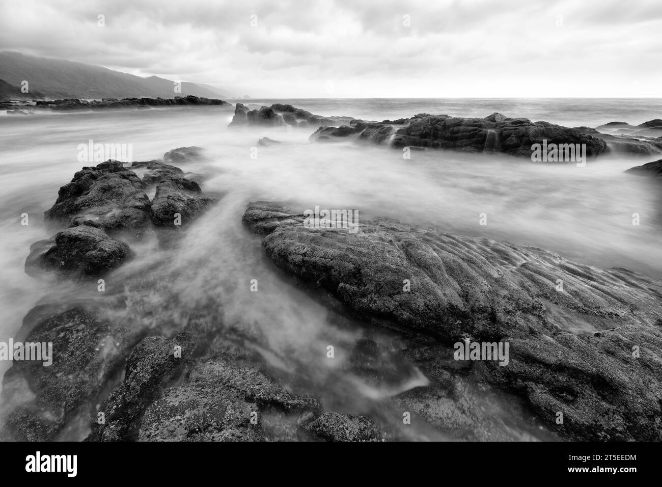 A Beautiful Ocean Sunset With A Wave Breaking On Shore High Resolution ...
