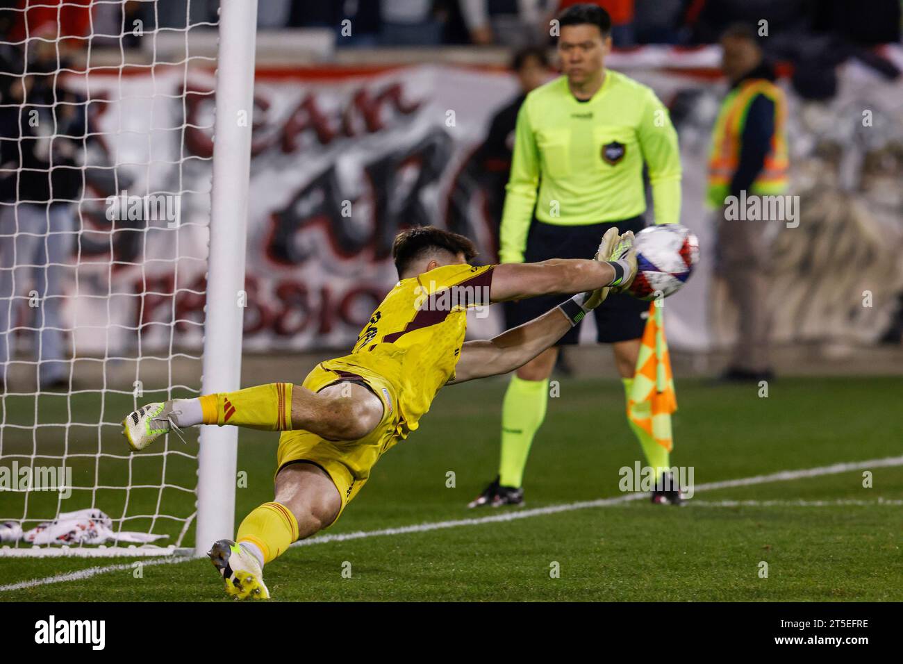 FC Cincinnati goalkeeper Roman Celentano stops a shot by New York Red ...