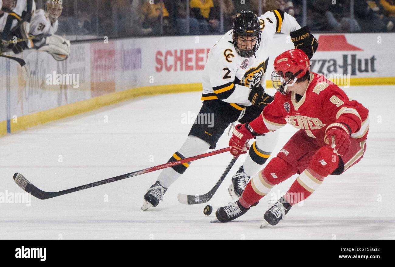 Colorado College forward Zaccharya Wisdom (2) skates past Denver ...