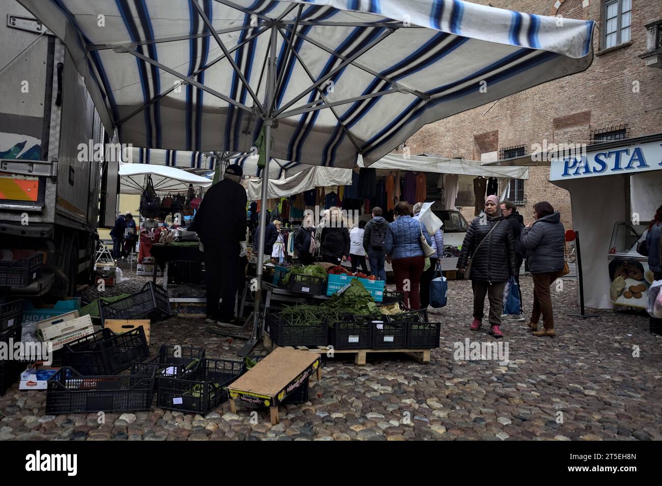 Mantova, Italy - October 2023 - Cobbled square in an italian town with ...