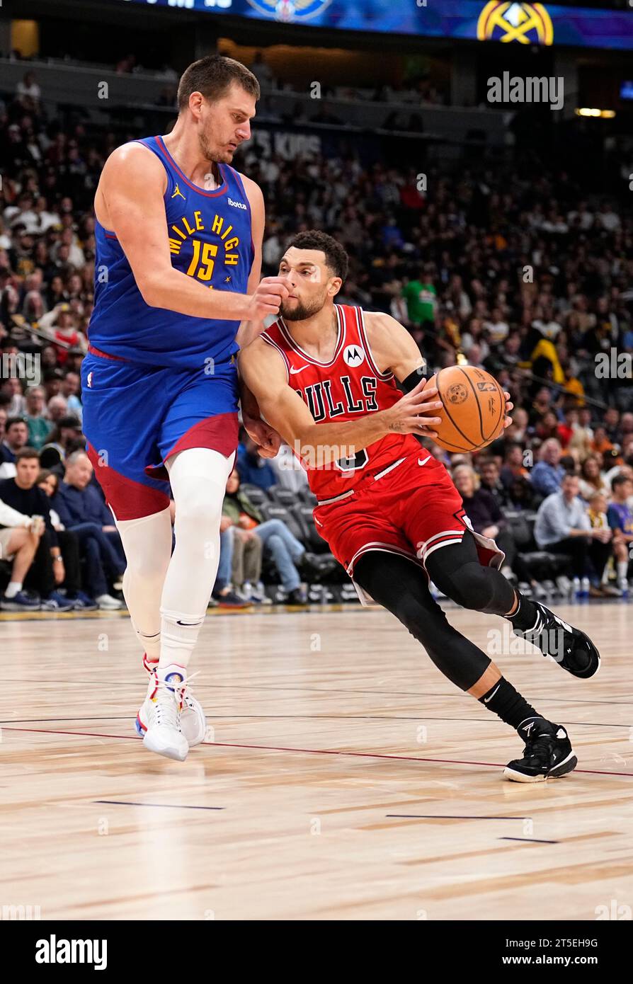 Chicago Bulls guard Zach LaVine, right, drives to the basket against ...