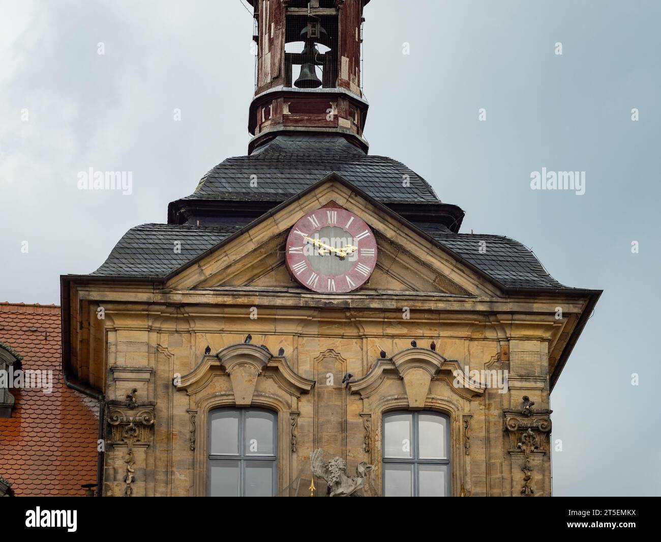 Clock on the town hall building in a close up view. Afternoon time on ...
