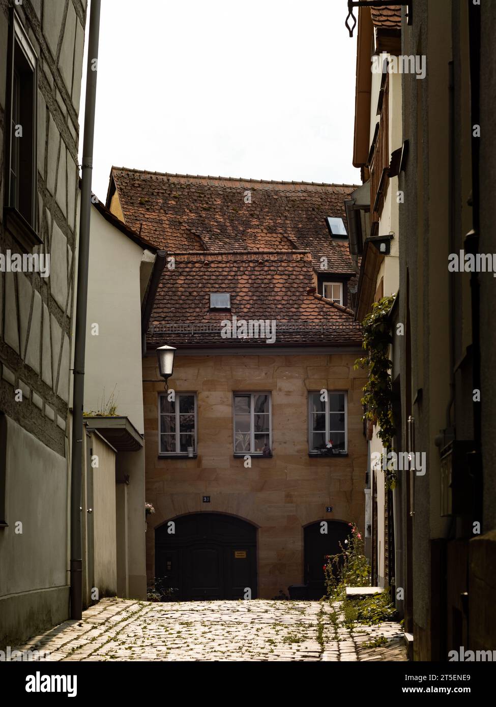 Lane in a German old town. Ancient buildings are next to the ...