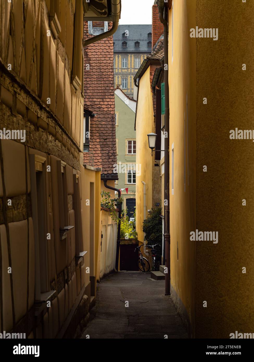 Narrow lane with old buildings. Beautiful historic town in Germany ...
