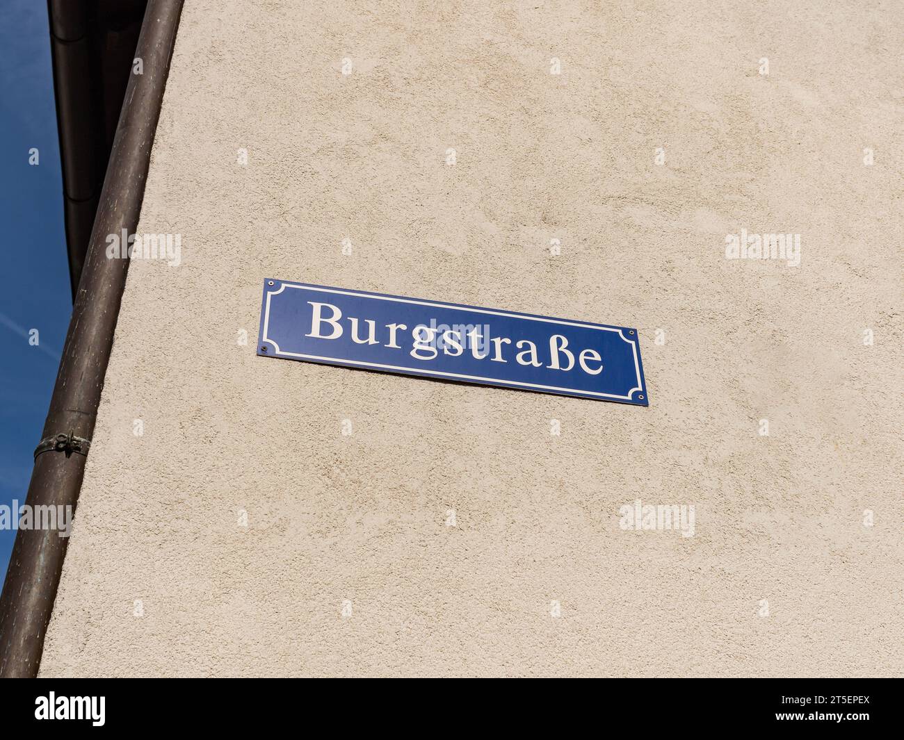 Burgstraße street name sign on a building exterior. The road signage is ...