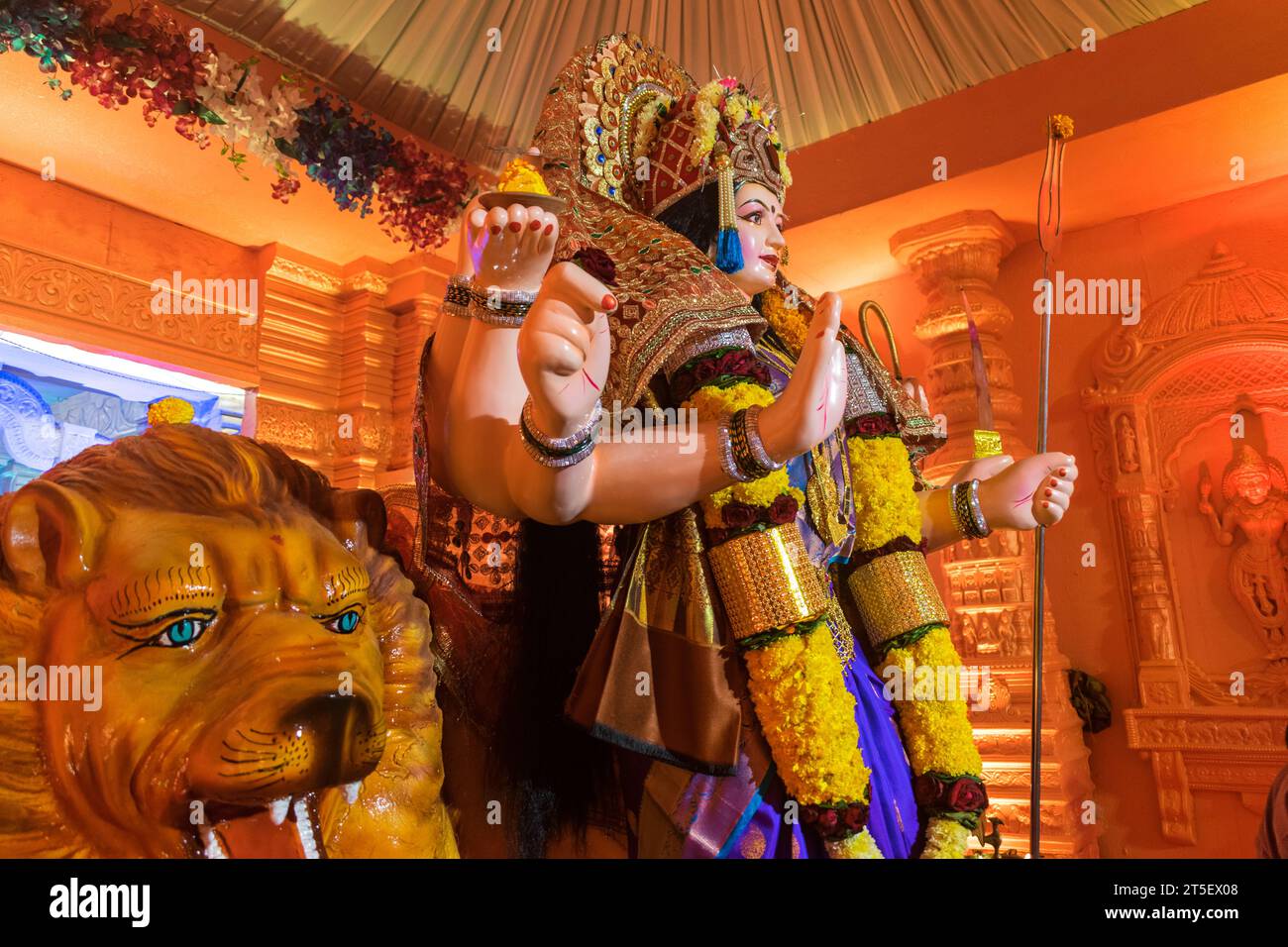 A beautiful idol of Maa Durga being worshipped at a pandal during ...