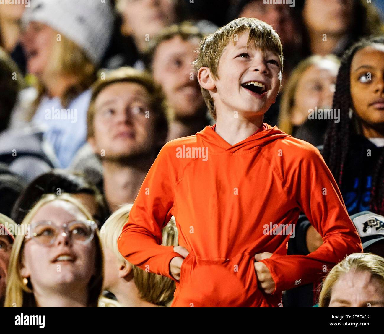 Boulder, CO, USA. 04th Nov, 2023. A young Oregon State fan cheers on ...