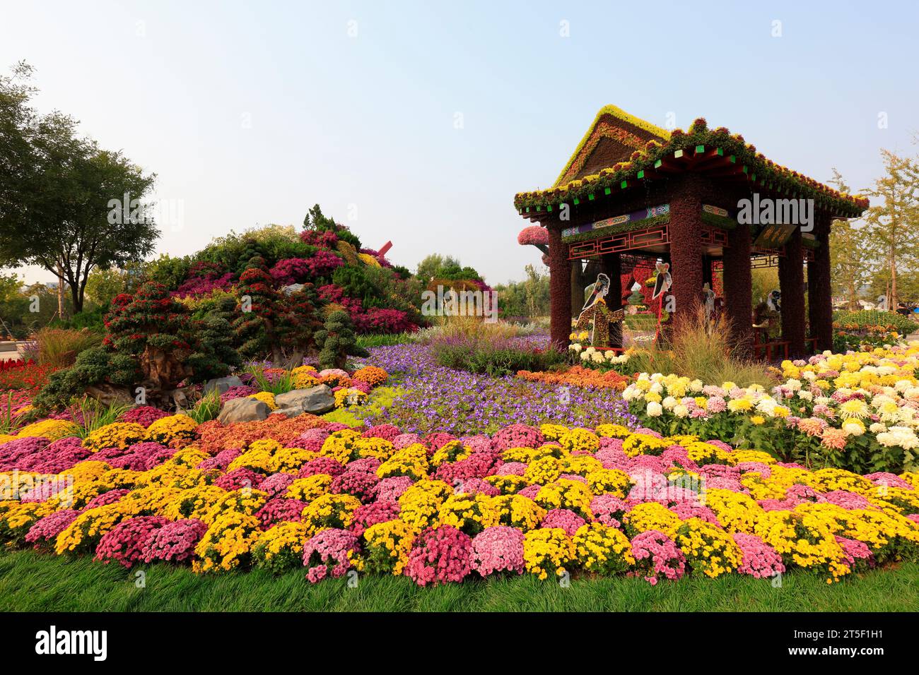 Chinese classical architecture is in a park Stock Photo - Alamy
