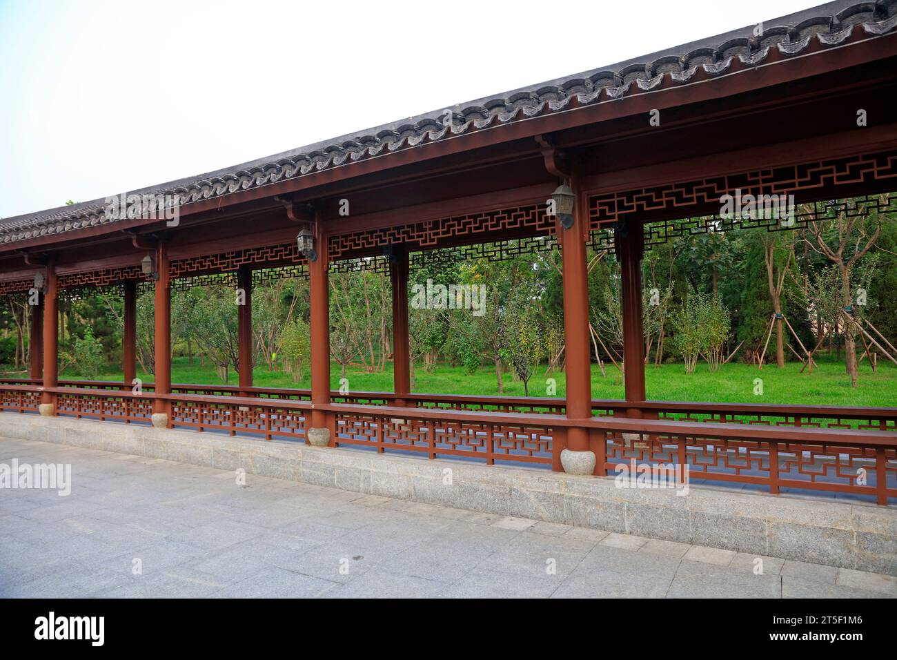 Chinese classical architecture is in a park Stock Photo - Alamy