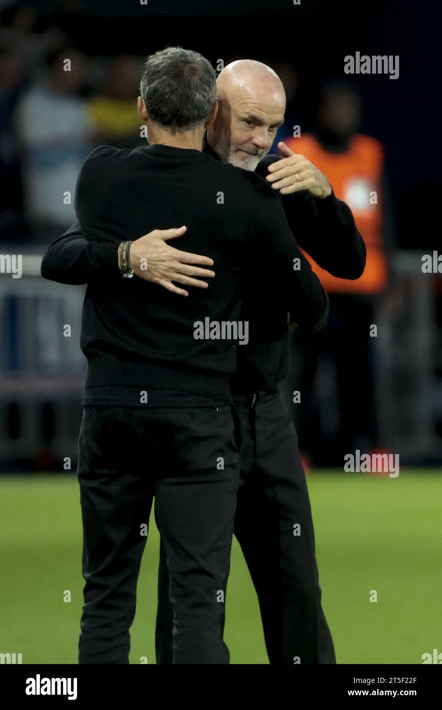 Coach of AC Milan Stefano Paoli hugs PSG coach Luis Enrique following ...