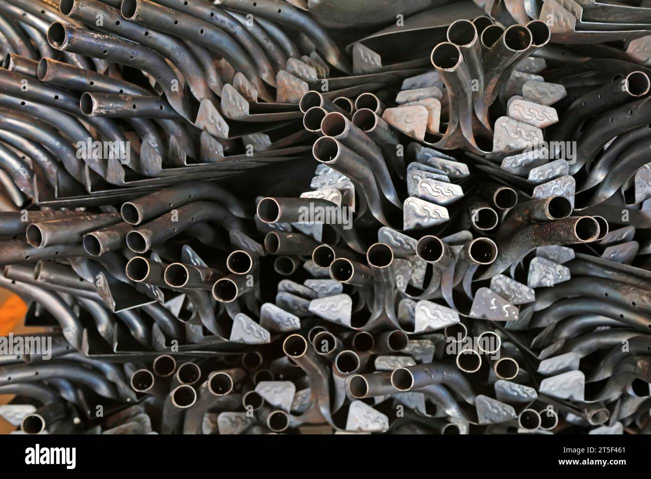 Piles of steel spades Stock Photo - Alamy