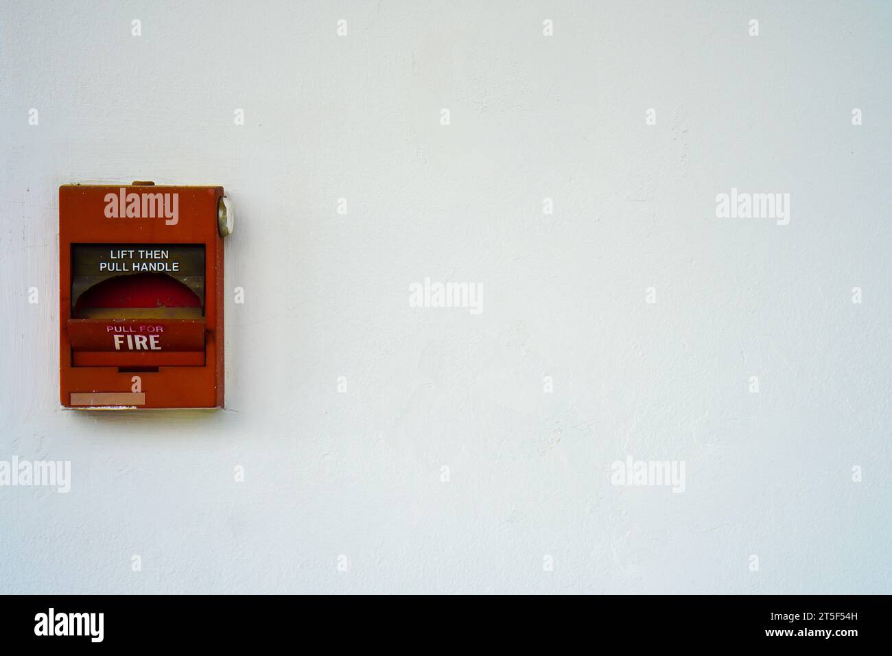 Broken Fire Alarm Still on the White Wall. Lingering Hazard Stock Photo ...