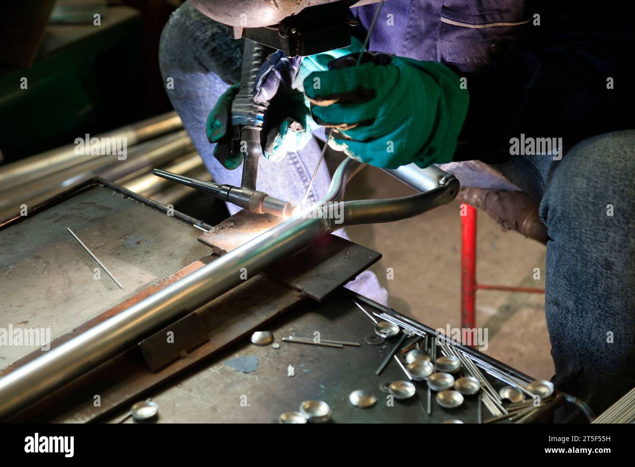 Welding of steel spade handle Stock Photo - Alamy